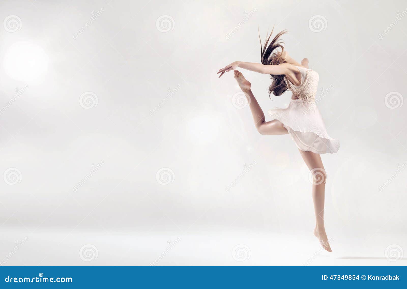 Pretty Female Ballet Dancer in Jump Figure Stock Photo - Image of girl ...
