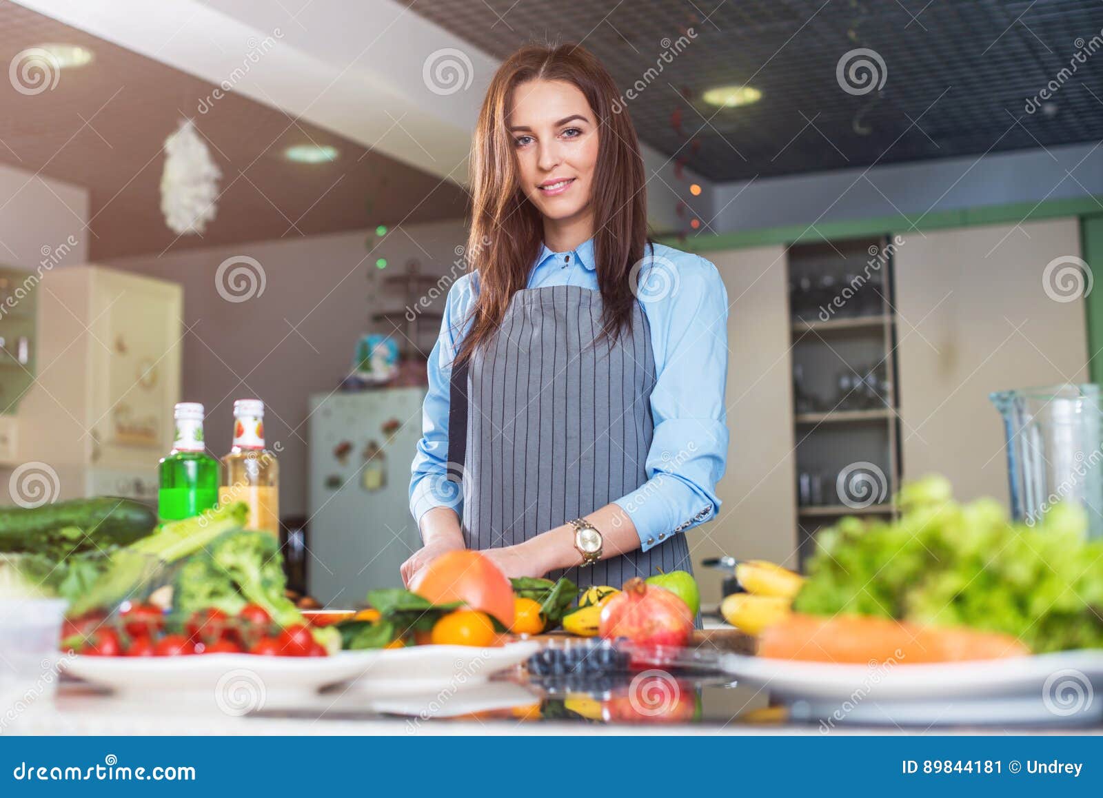 Pretty Female Chef Standing, Cooking , Posing, Looking at Camera with ...