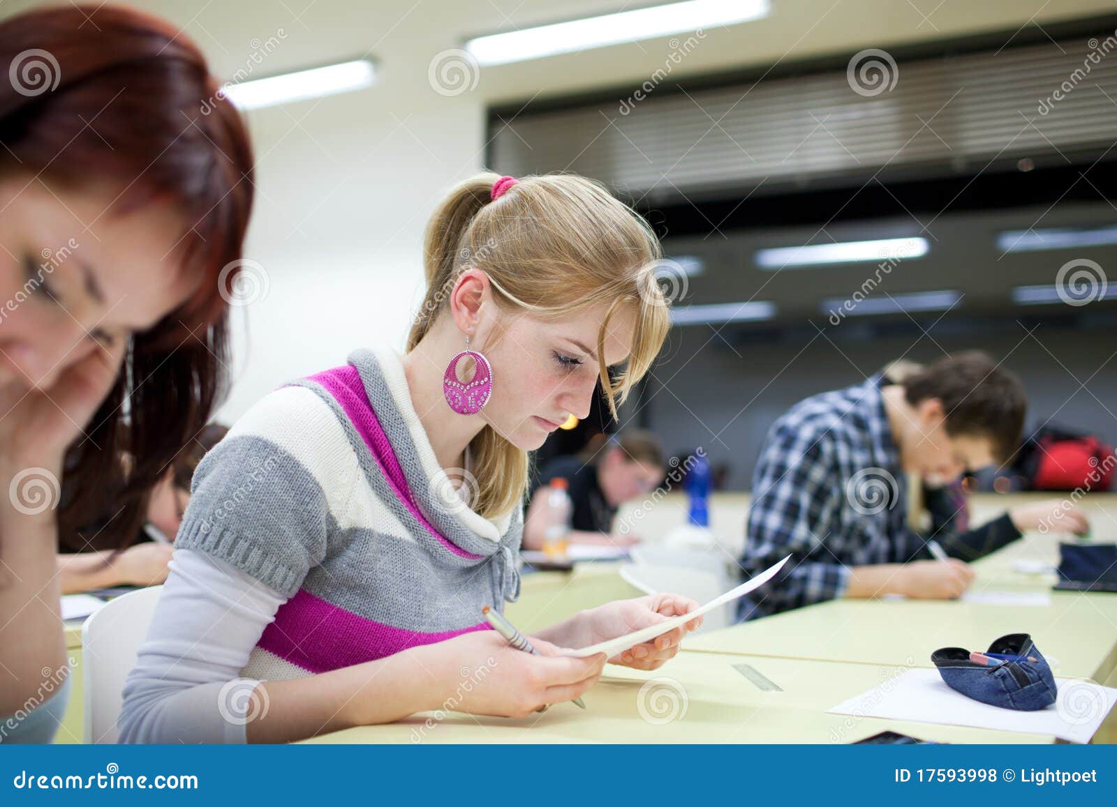 Pretty Female College Student in a Classroom Stock Photo - Image of ...