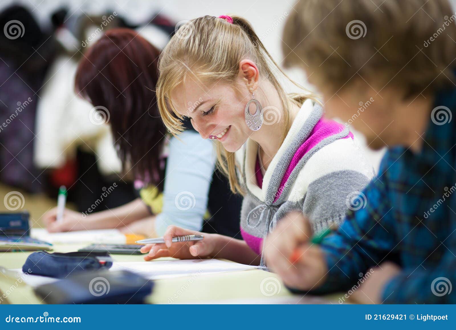 Pretty Female College Student in a Classroom Stock Image - Image of ...