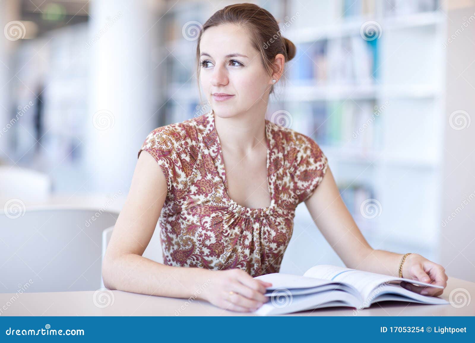 Pretty Female College Student in a Library Stock Photo - Image of ...