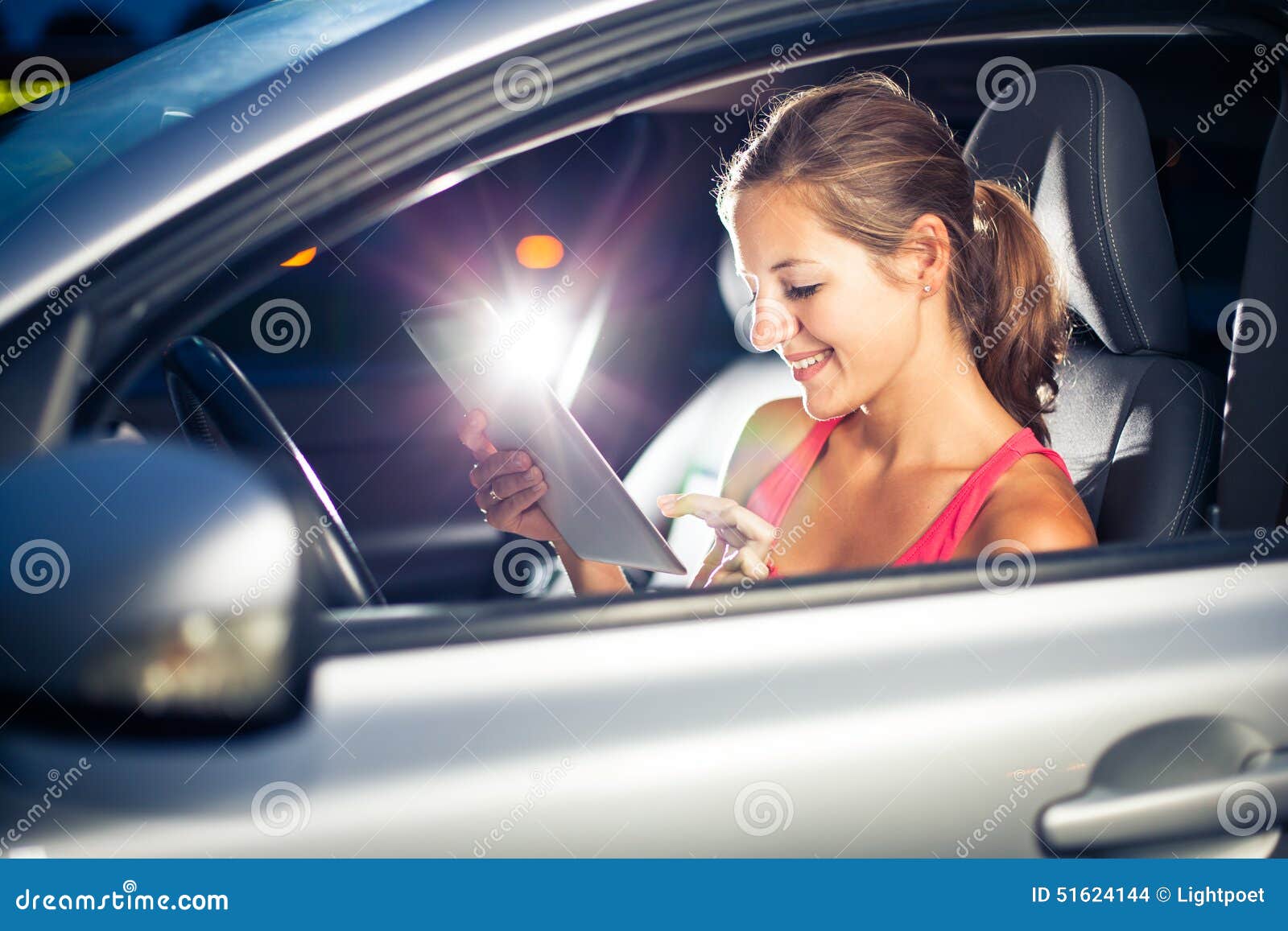 Pretty, Female Driver Using Her Tablet Computer Stock Photo - Image of ...