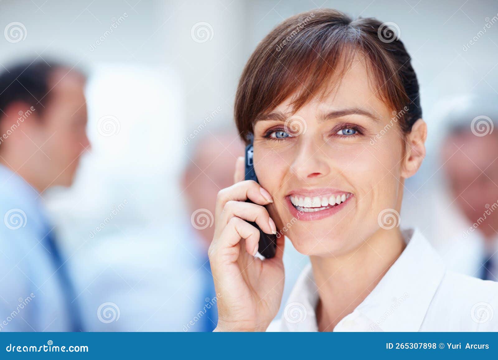 Pretty Female Executive on Cell Phone. Head Shot of Female Executive on ...