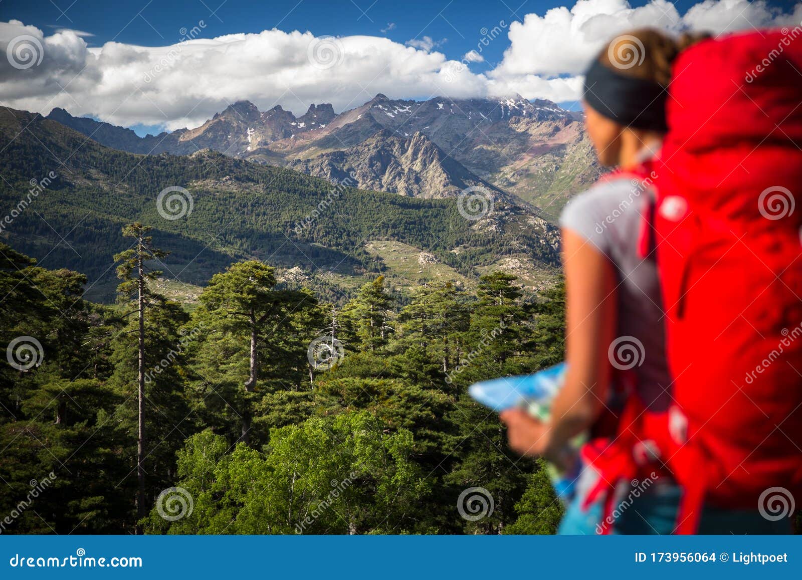 Pretty, Female Hiker in High Mountains Using a Map Stock Photo - Image ...