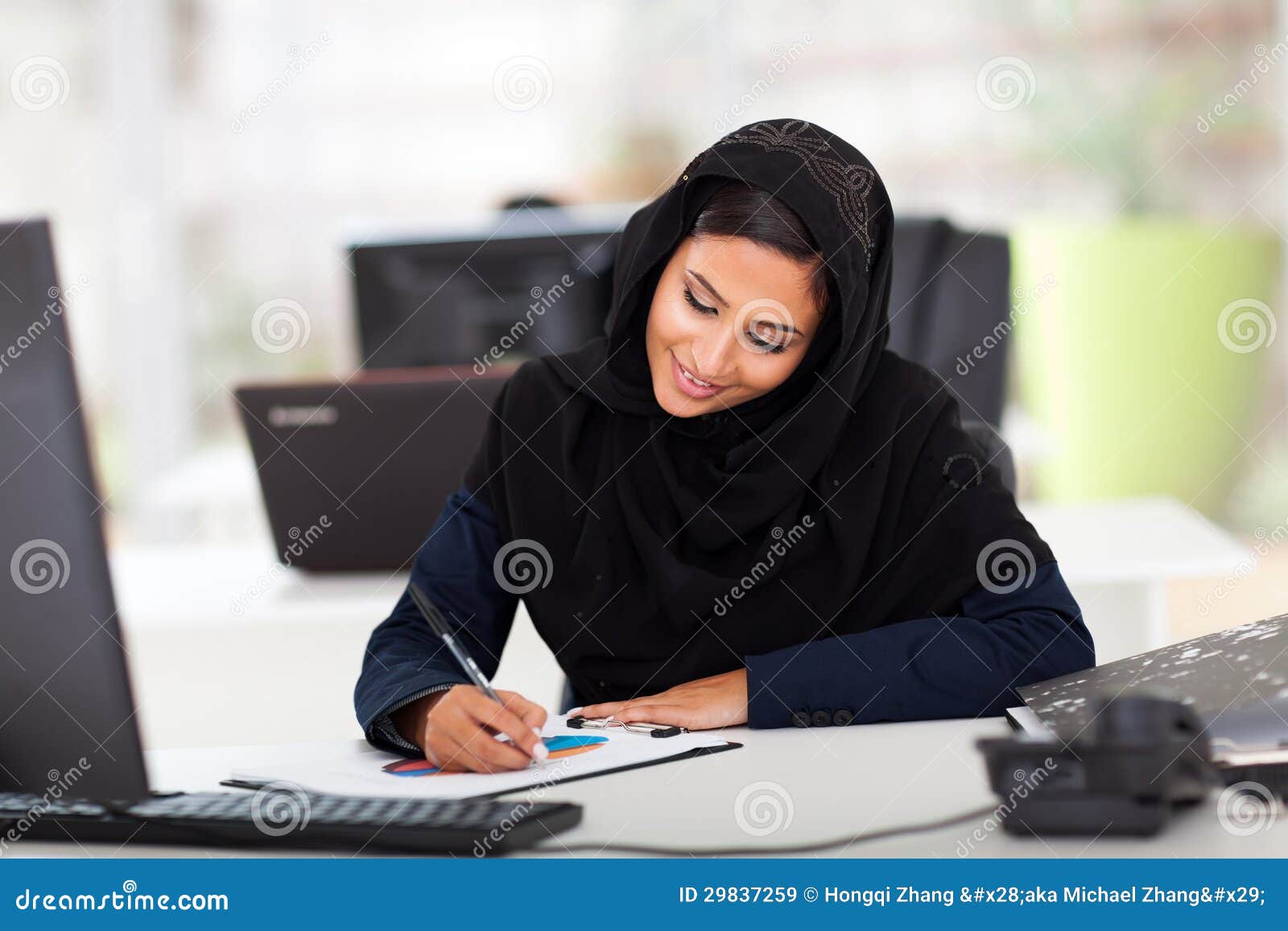 Middle Eastern Office Worker Stock Image - Image of businesswoman ...
