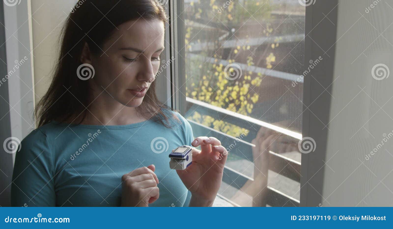 Pretty Female is Using Pulse Oximeter Checking Her Oxygen Level ...