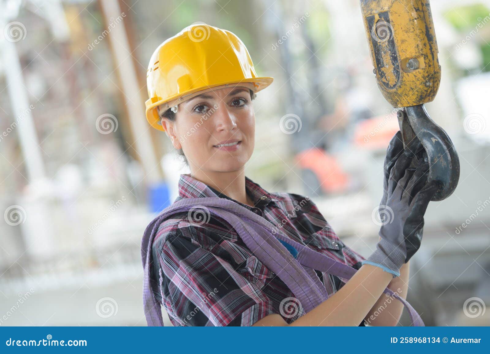 Pretty Female Worker Holding Crane Hook Stock Photo - Image of plate ...