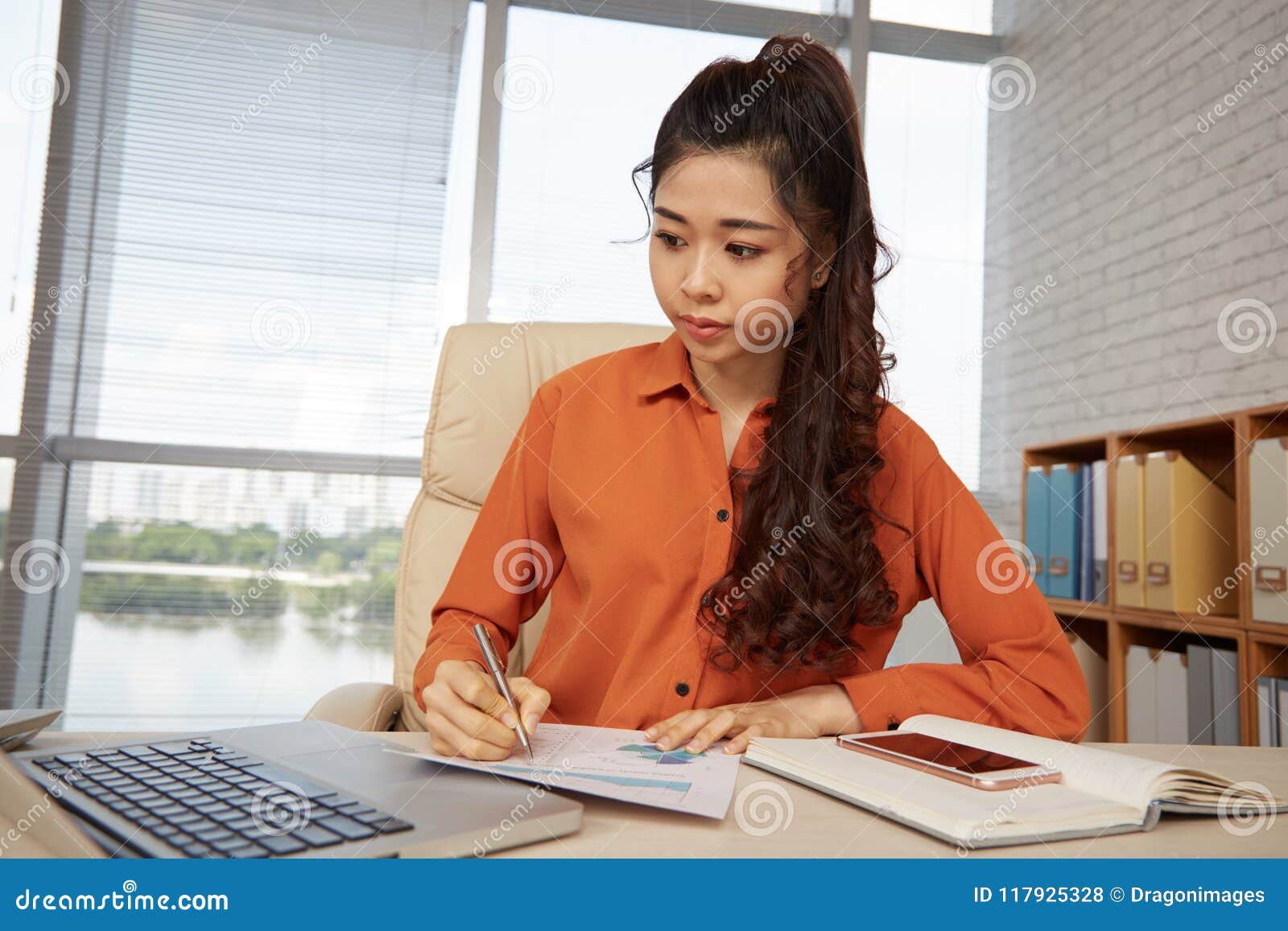 Pretty financial analyst stock photo. Image of table - 117925328