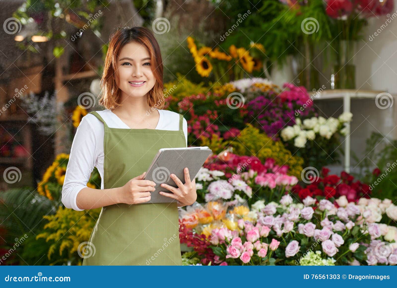 Pretty florist stock image. Image of seller, asian, holding - 76561303