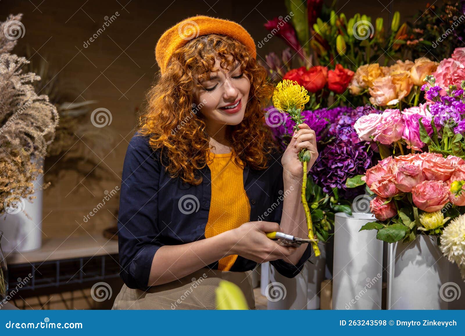 Pretty Florist Sorting the Flowers and Looking Involved Stock Photo ...