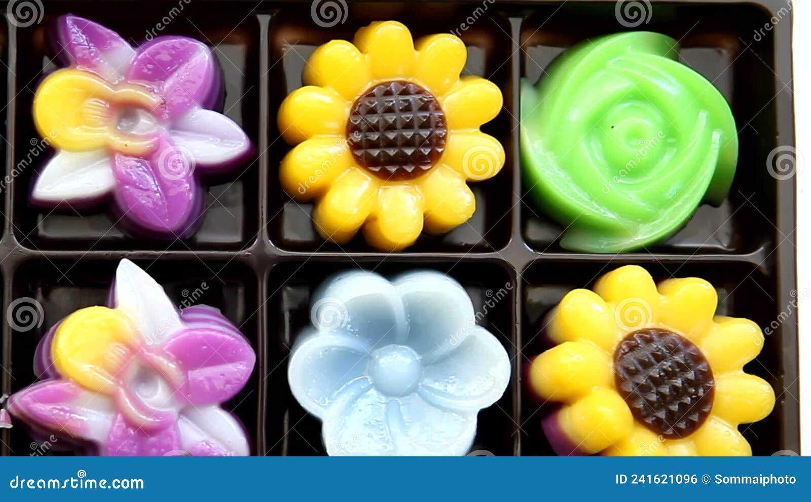 Pretty Flower Shaped Desserts in a Black Tray Stock Footage - Video of ...