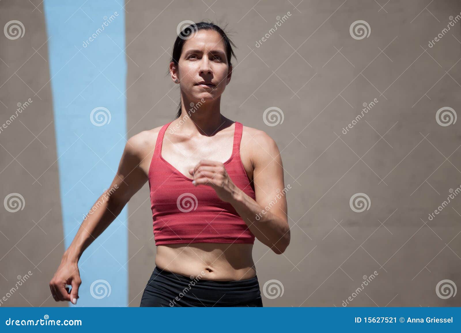 Pretty, Focused Woman Runs To Keep in Shape. Stock Image - Image of ...