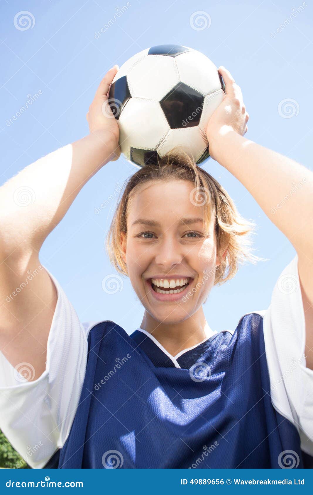 Pretty Football Player Smiling at Camera Stock Photo - Image of smiling ...