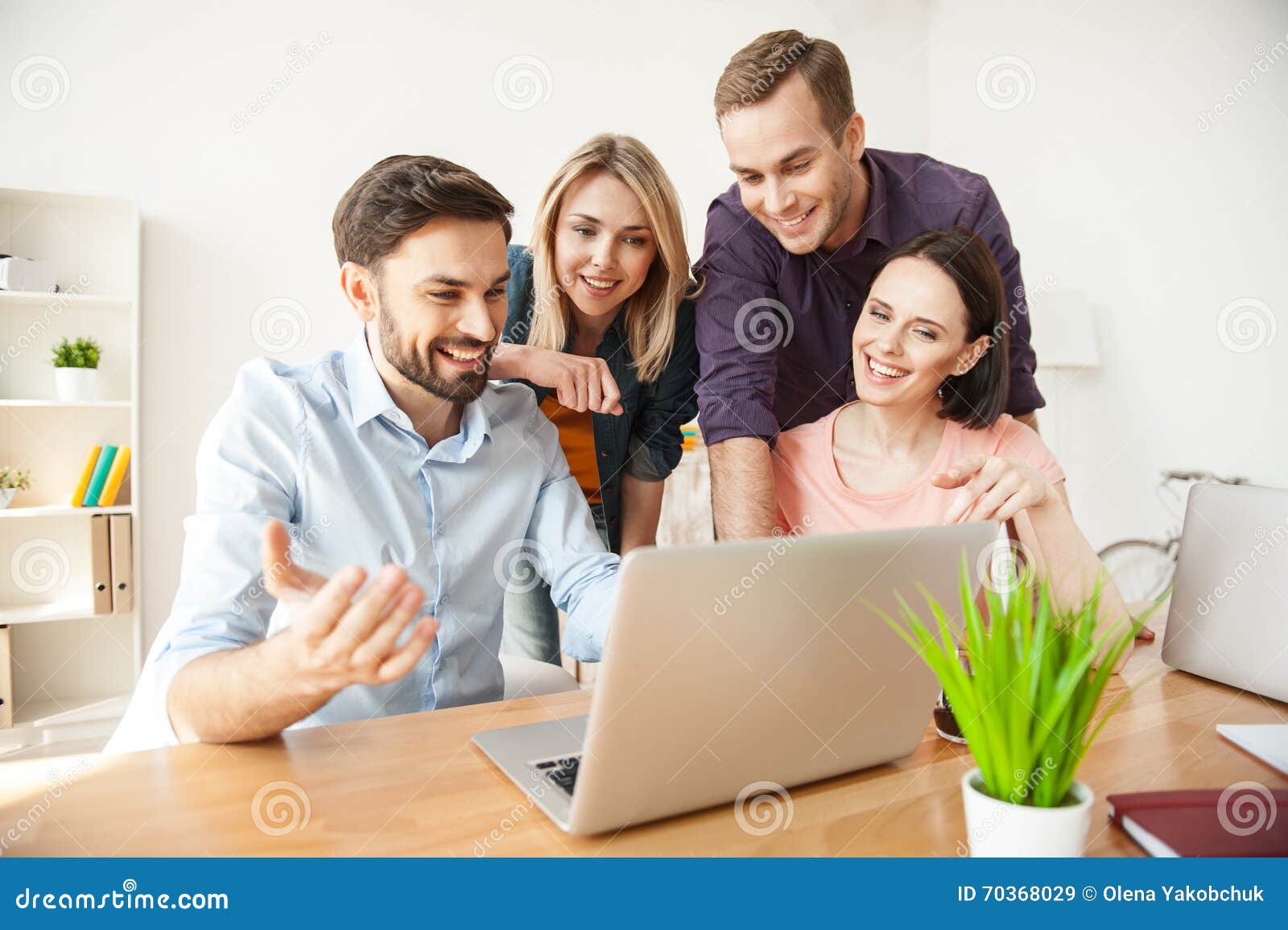 Pretty Four Office Workers are Discussing a Project Stock Image - Image ...