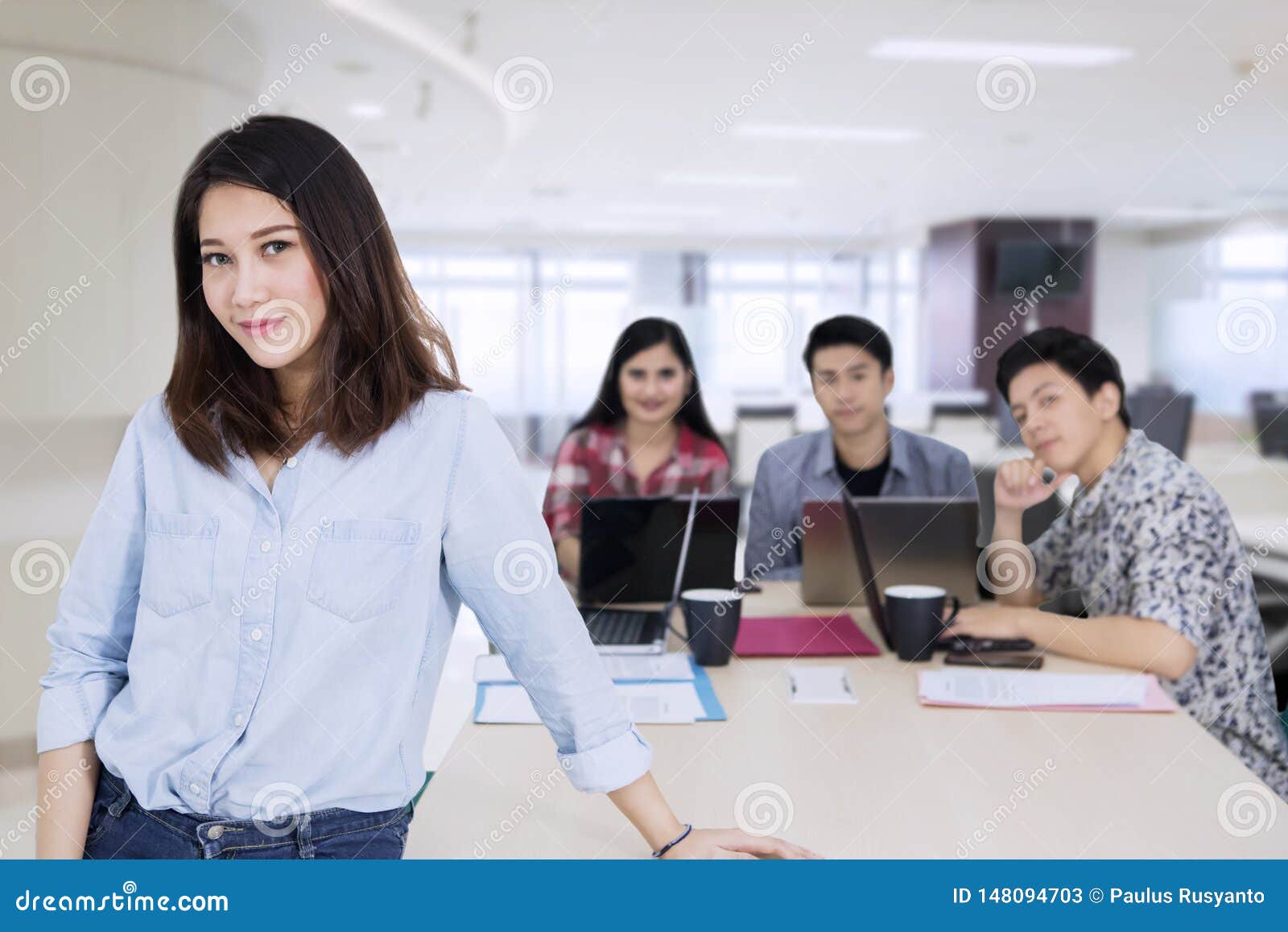 Pretty Freelancer Standing in Front of Her Team Stock Image - Image of ...