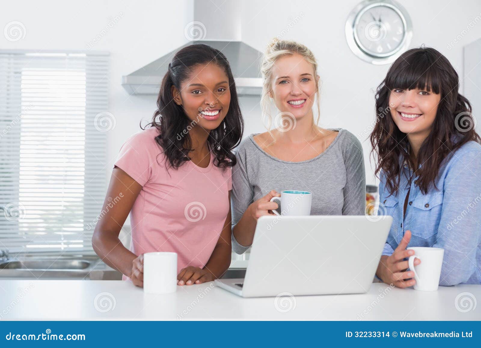 Pretty Friends Having Coffee Together with Laptop Stock Photo - Image ...