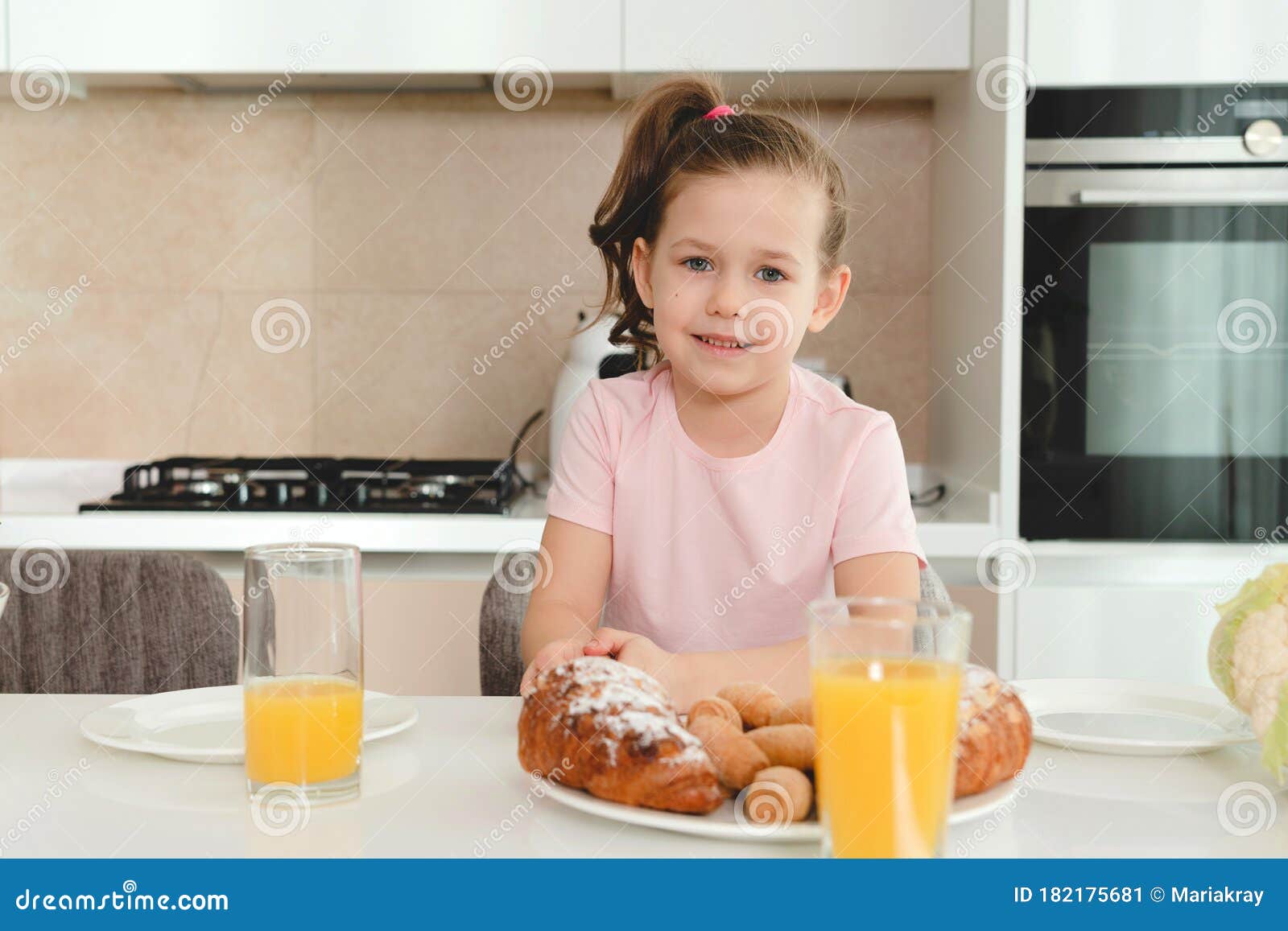 Pretty Girl Eating Breakfast in the Kitchen Alone Stock Image - Image ...