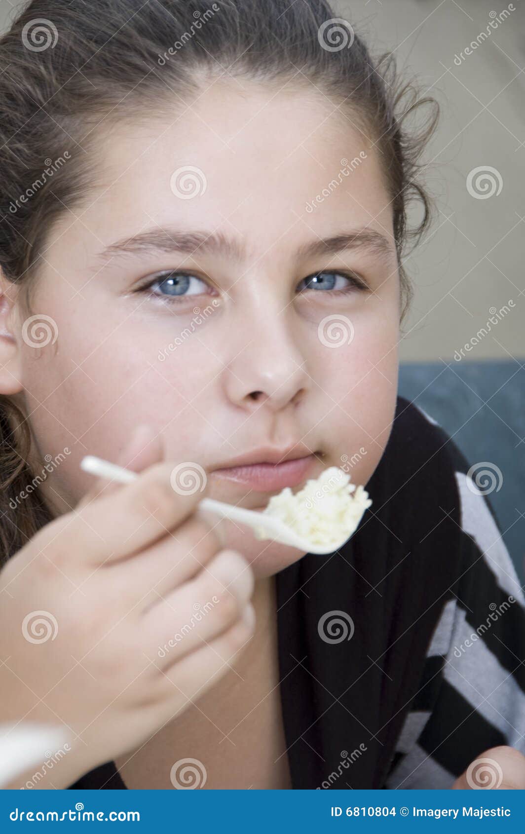 Pretty girl eating rice stock photo. Image of ethnic, happy - 6810804