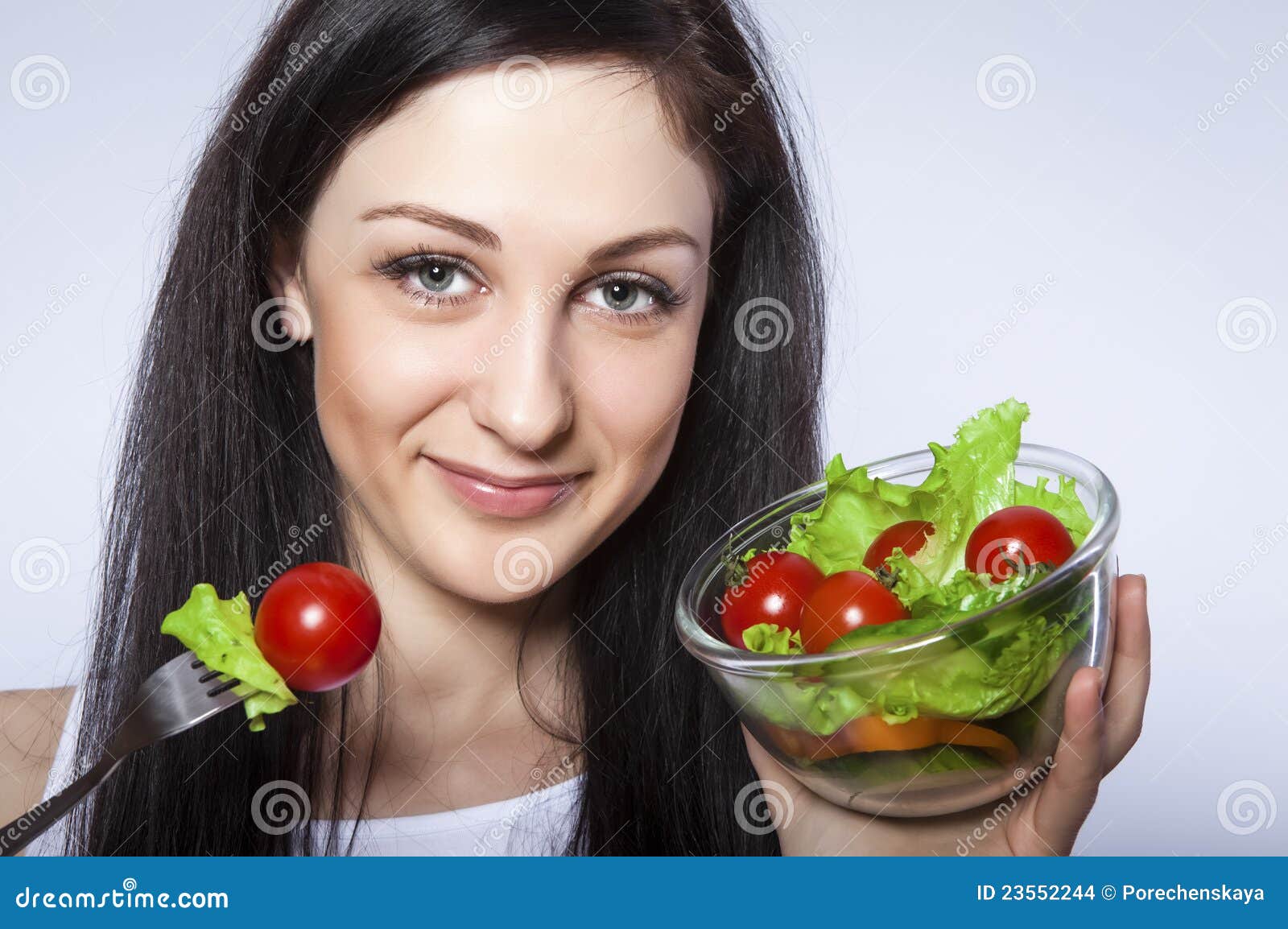 Pretty girl eating salad stock photo. Image of health - 23552244