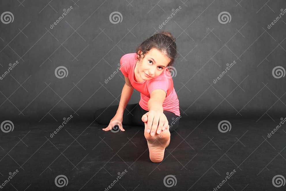 Pretty Girl Exercising Stretching And Holding Her Toes Stock Image Image Of Female Active