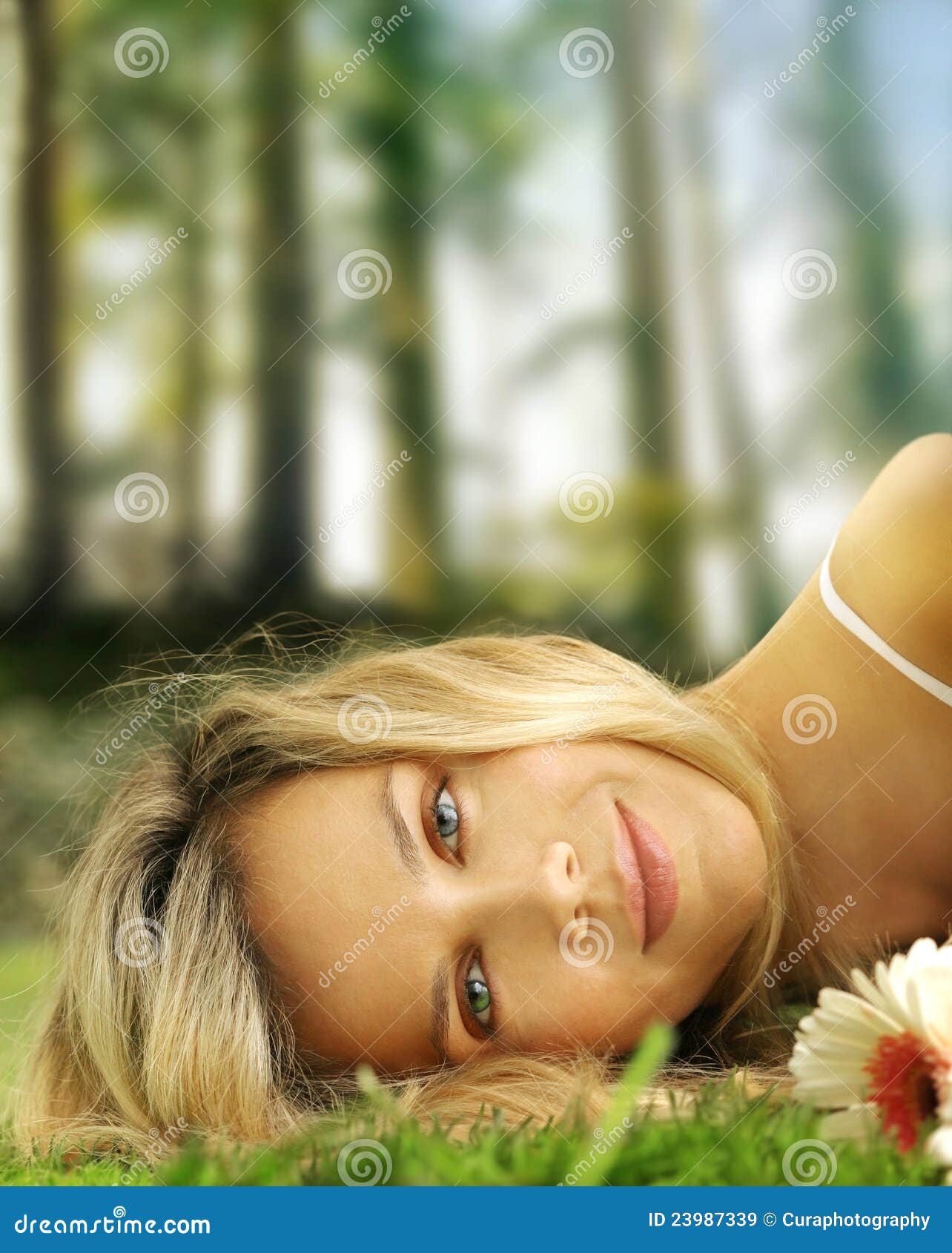 Pretty Girl and Flower in Grass Stock Image - Image of grass, lying ...