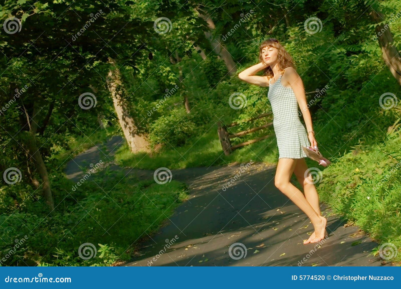 Pretty girl on forest path stock photo. Image of girl - 5774520