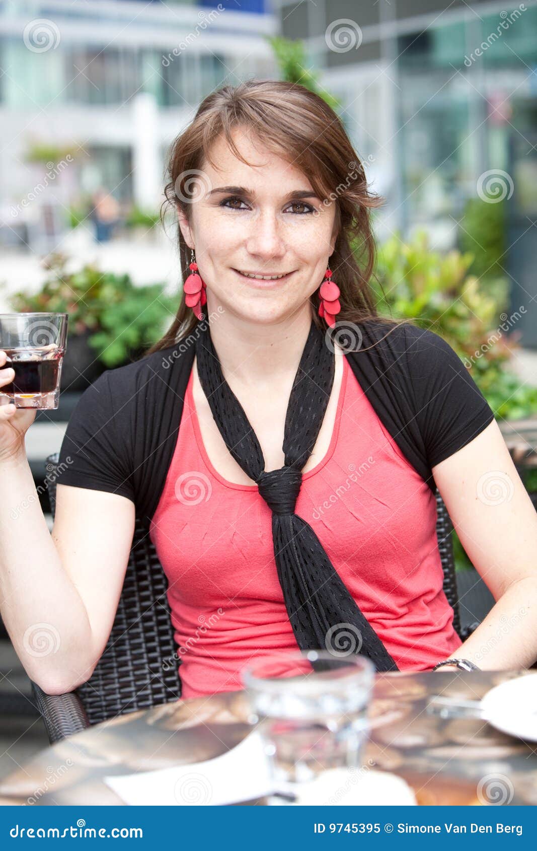 Pretty girl with her drink stock image. Image of drinking - 9745395