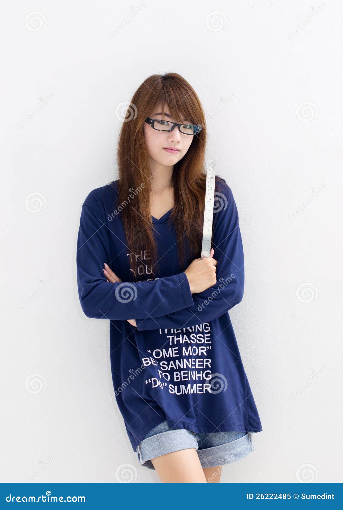 Pretty girl hold the ruler stock image. Image of study - 26222485