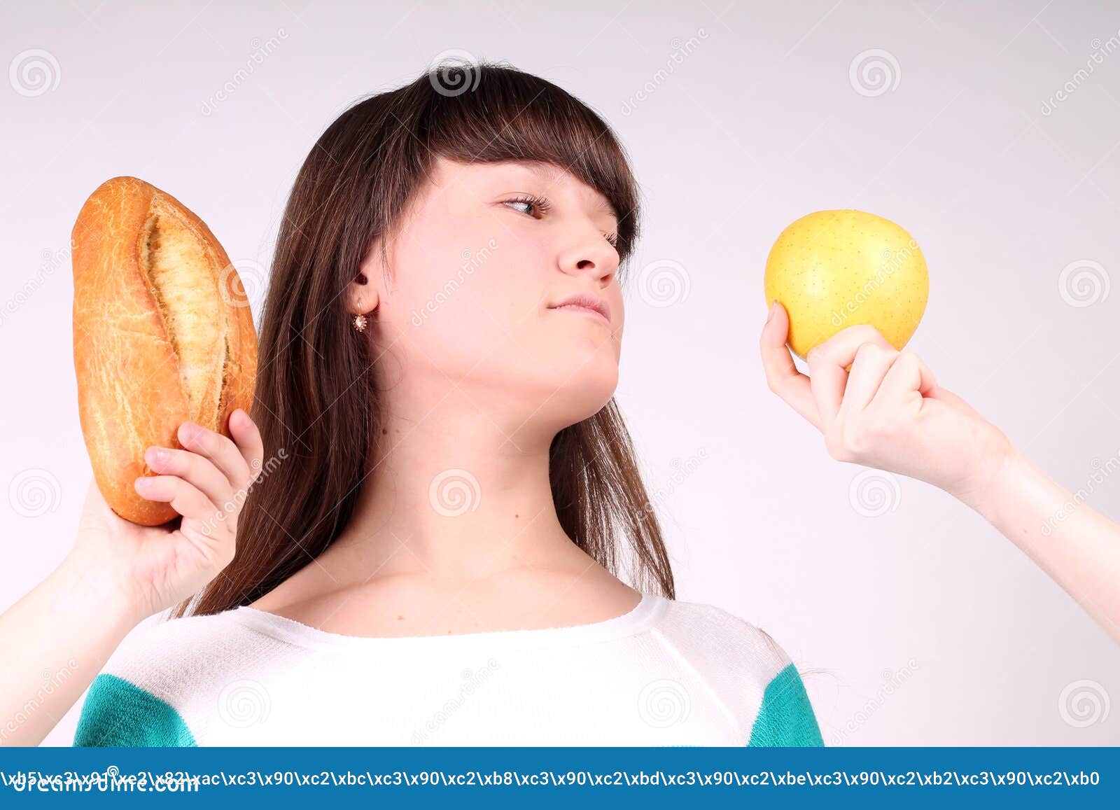 Pretty Girl Holding and Biting Loaf of Bread Stock Photo - Image of ...