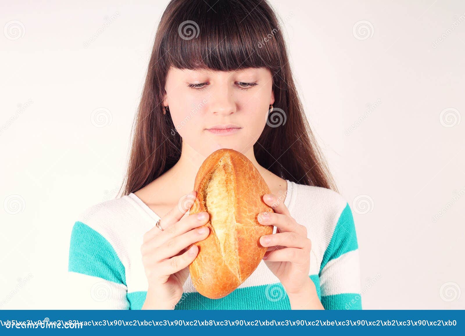 Pretty Girl Holding and Biting Loaf of Bread Stock Image - Image of ...