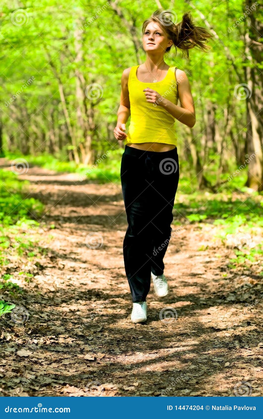 Pretty girl jogging stock photo. Image of running, grass - 14474204