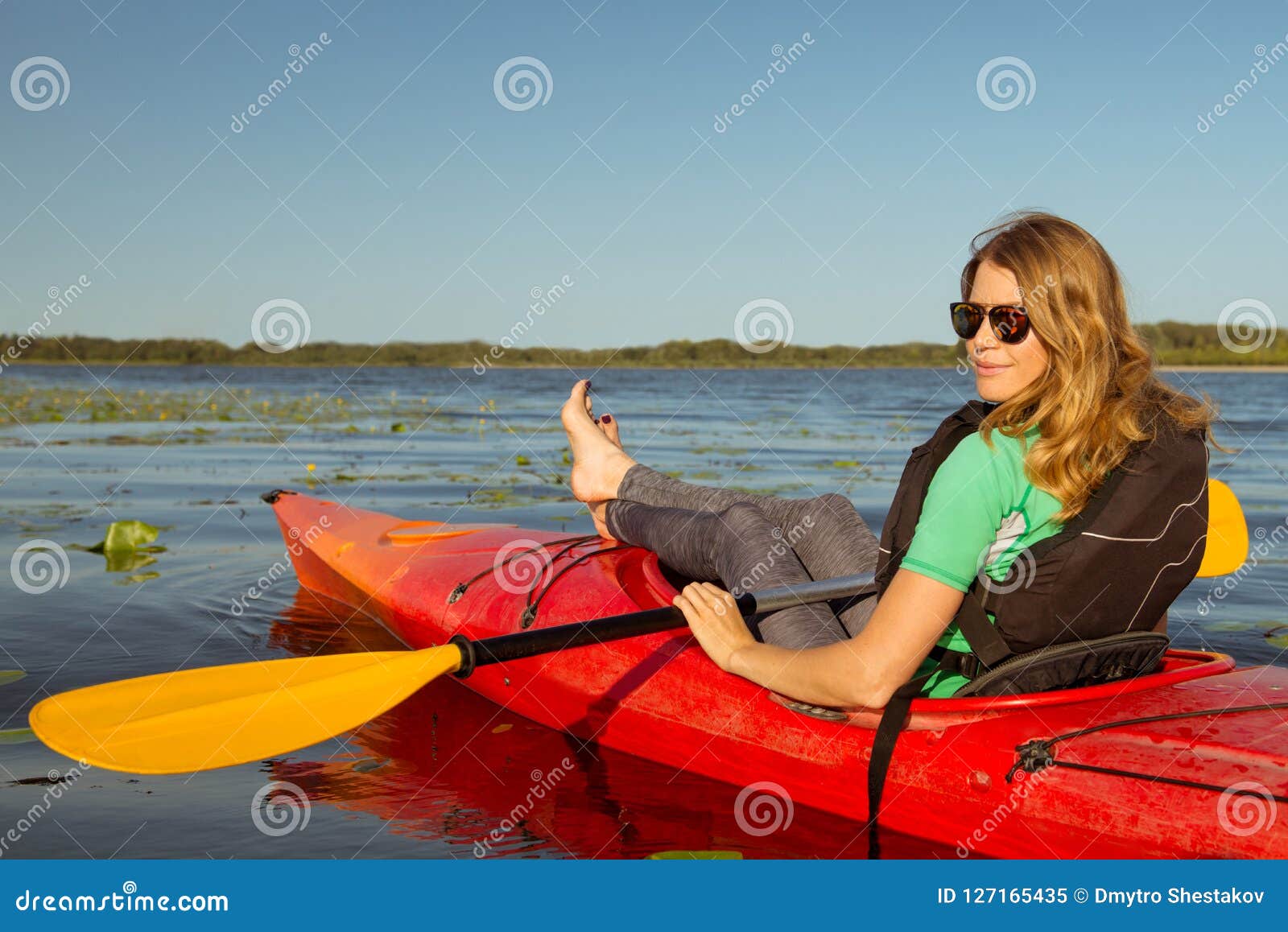 Pretty Girl in a Kayak on a River Stock Image - Image of paddle, blonde ...