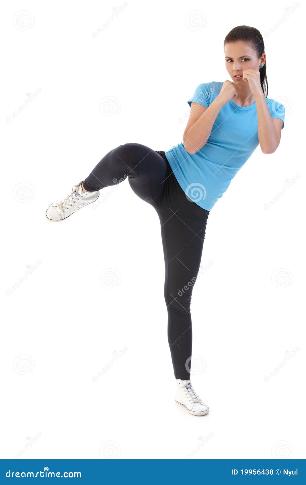 Pretty girl kick-boxing stock photo. Image of energetic - 19956438