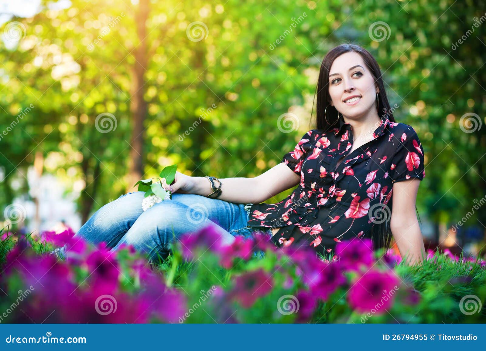Pretty Girl Laying in the Flower Bed Stock Image - Image of happy ...