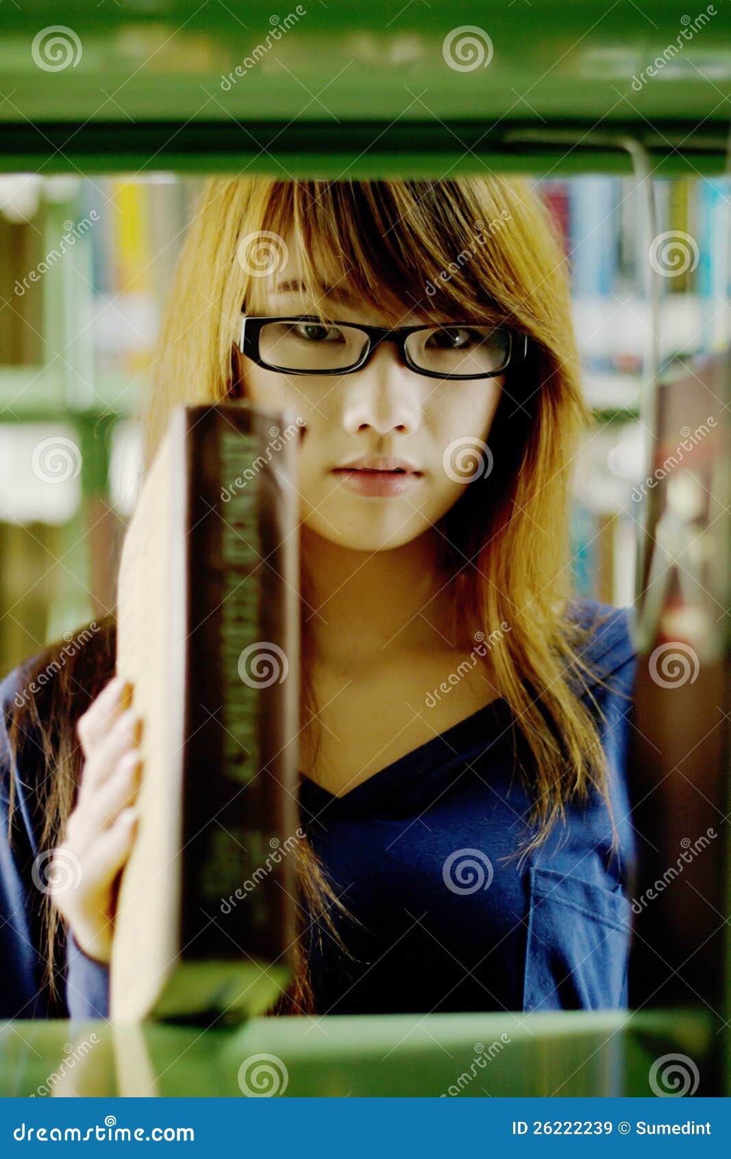 Pretty girl in library stock image. Image of education - 26222239
