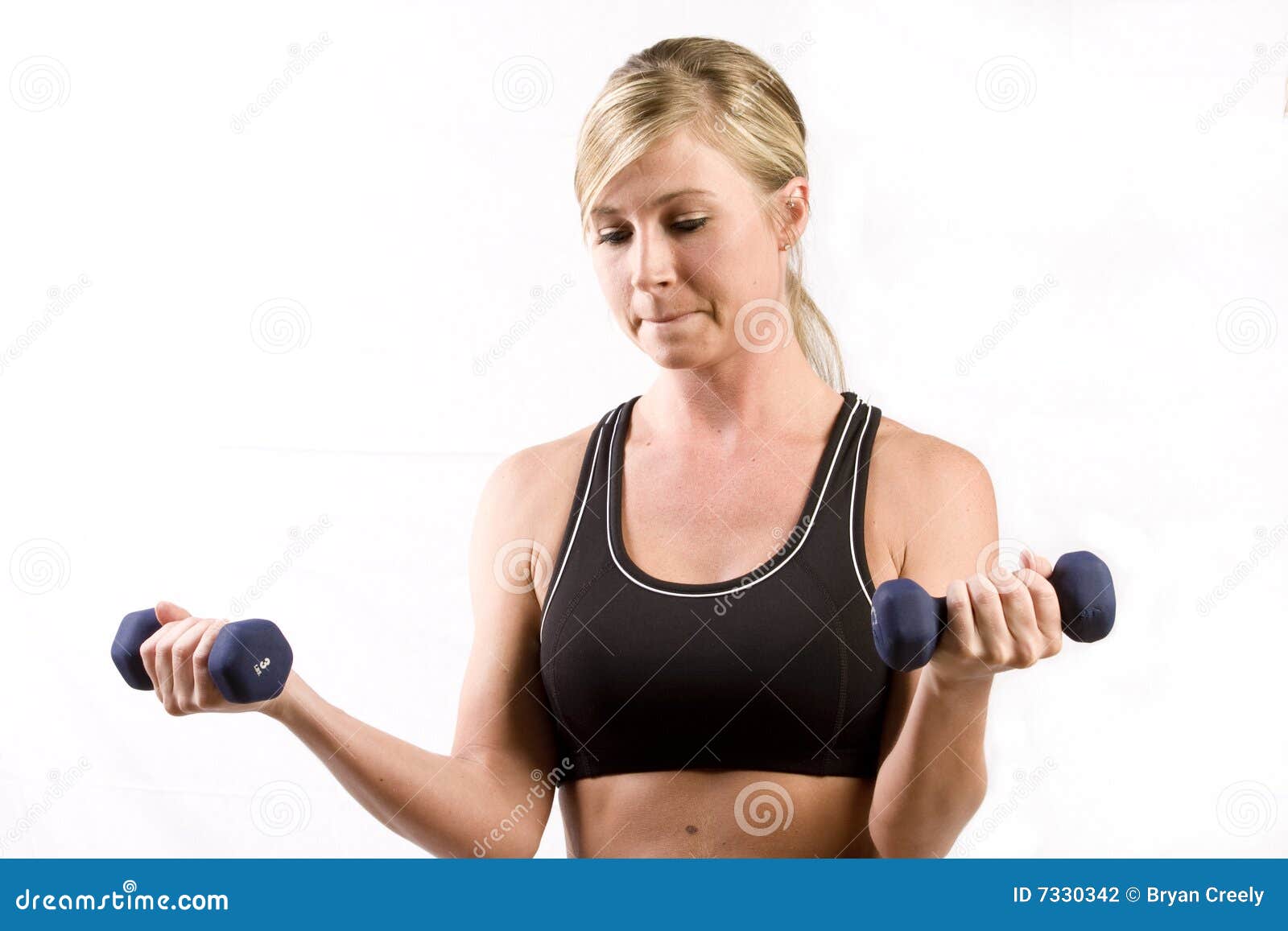 Pretty Girl Lifting Two Weights Stock Photo - Image of ball, curls: 7330342