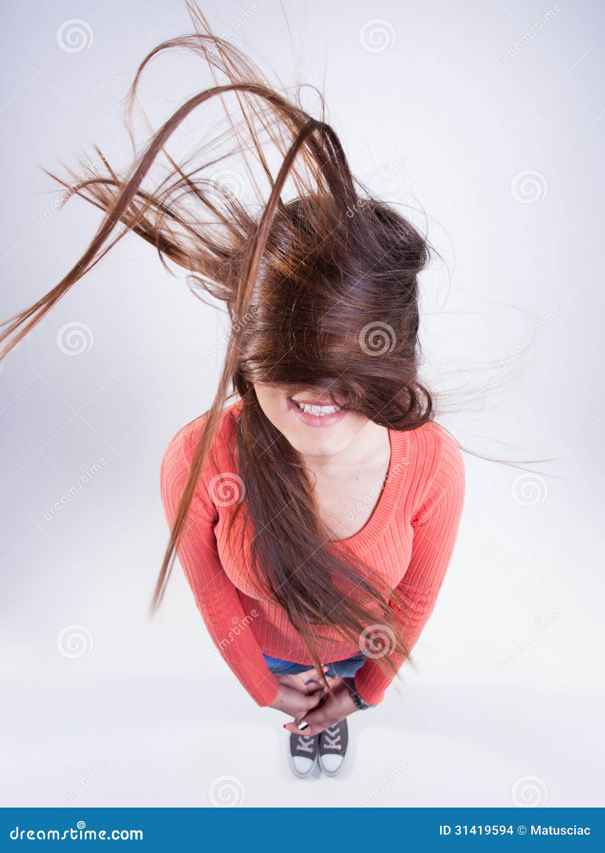 Pretty Girl with Long Hair Blowing in the Wind Smiling Stock Photo ...