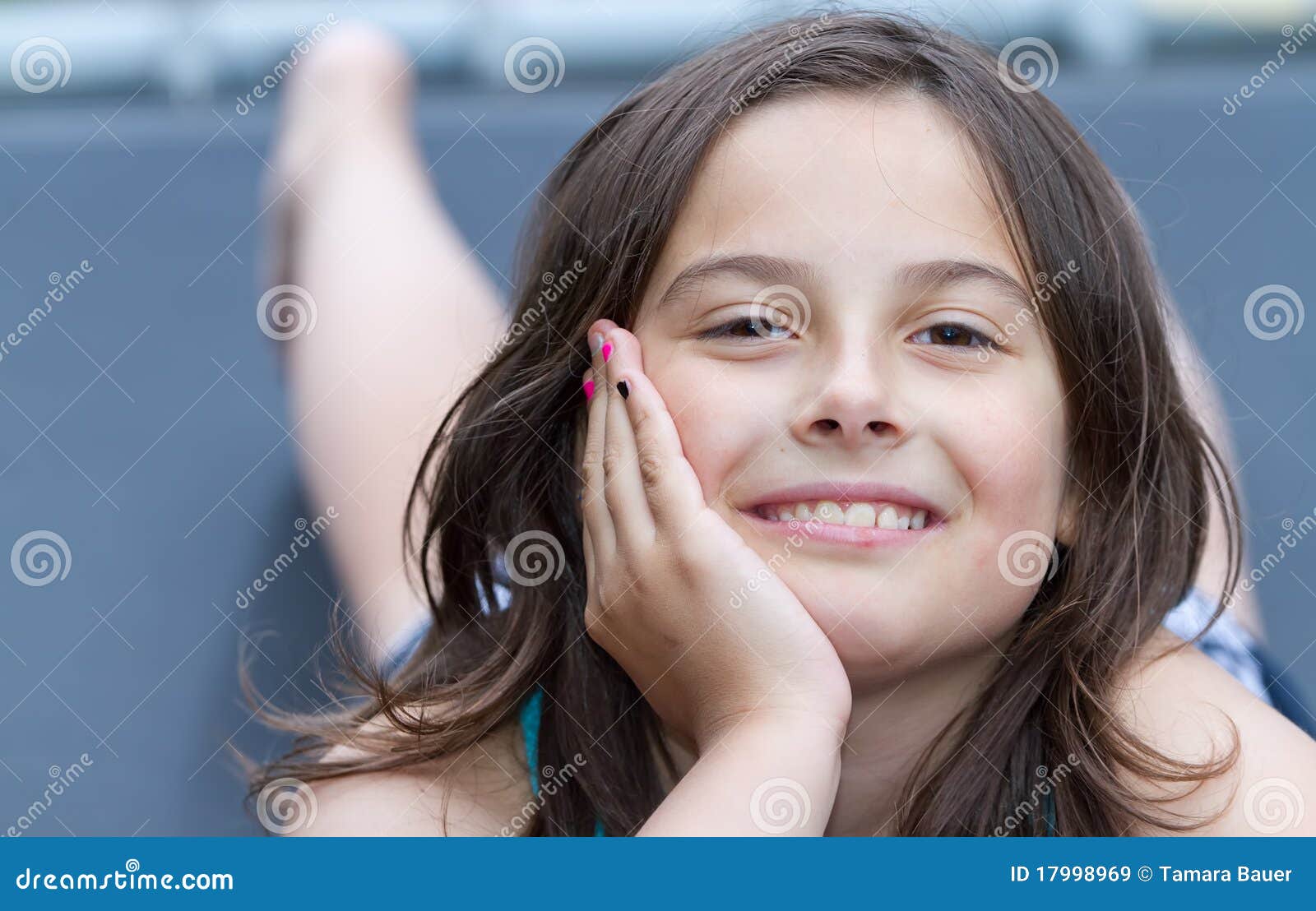 Pretty girl lying down stock image. Image of lifestyle - 17998969