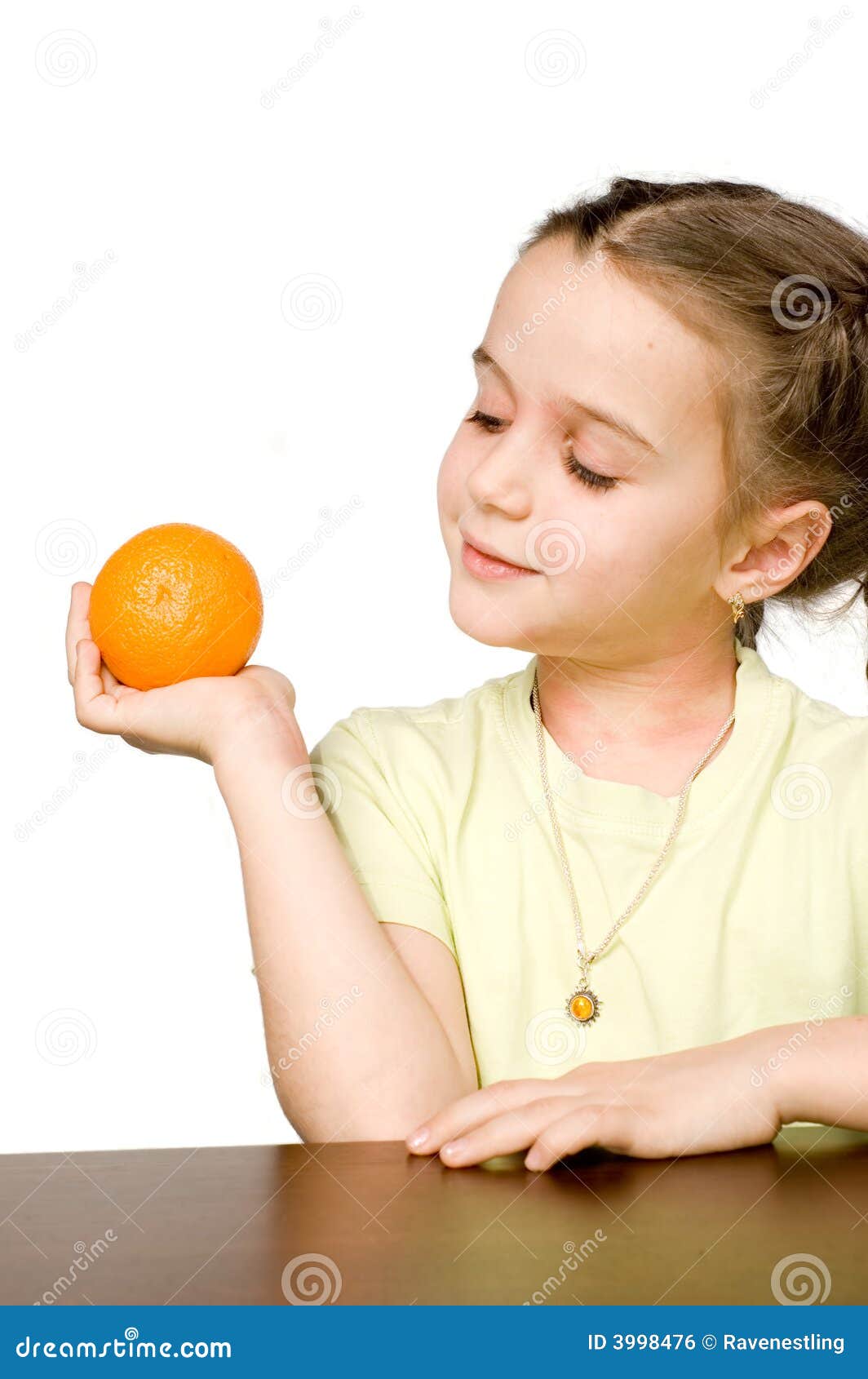 Pretty girl with orange stock photo. Image of portrait - 3998476