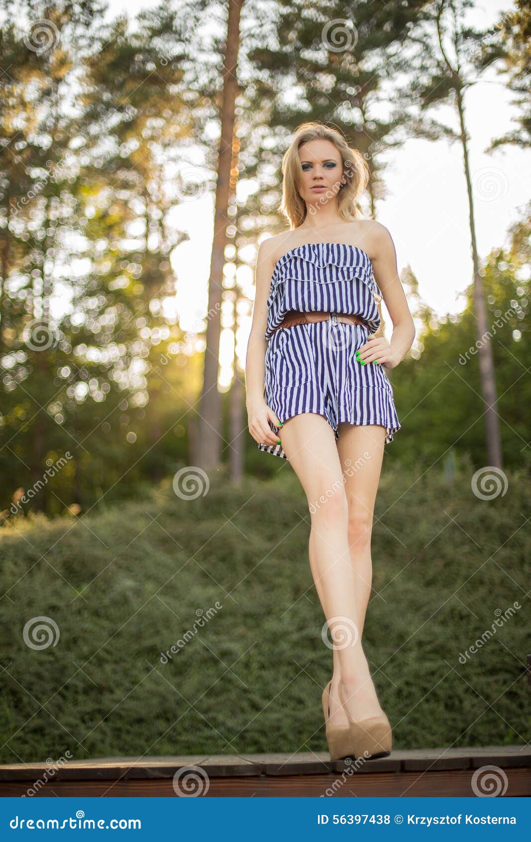 Pretty girl in park stock photo. Image of boots, fashion - 56397438