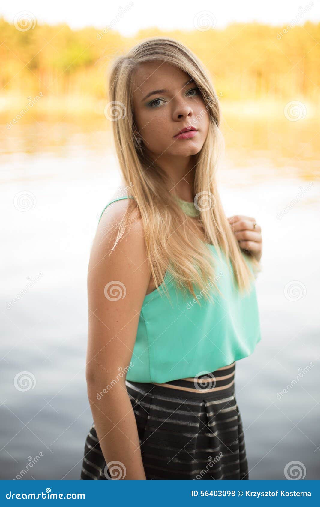 Pretty girl in park stock photo. Image of boots, lake - 56403098