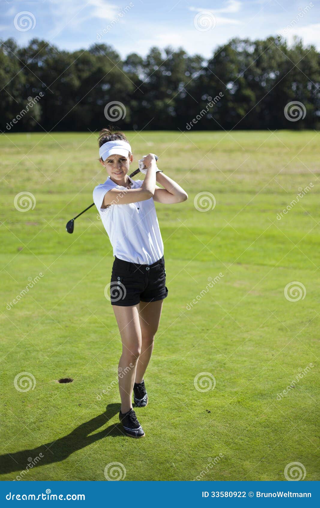 Pretty Girl Playing Golf On Grass Stock Photo - Image of happy, hole ...