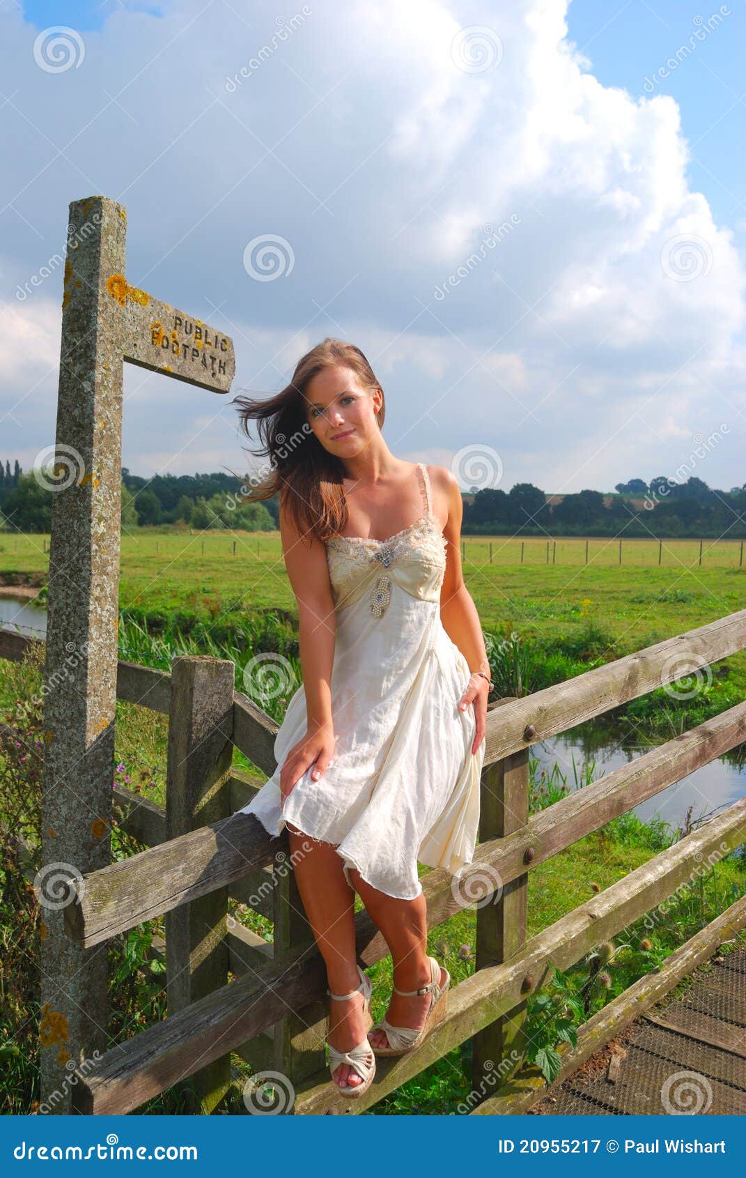 Pretty Girl by Public Footpath Stock Image - Image of sitting, country ...