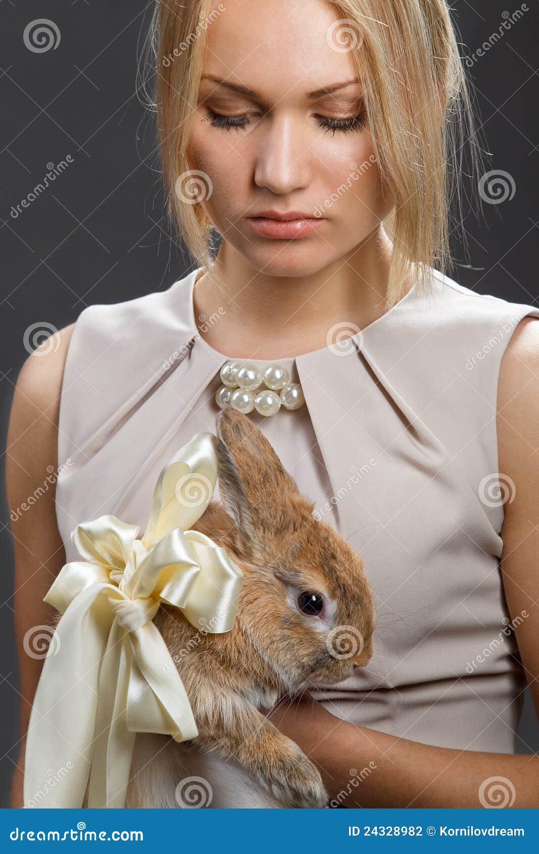 Pretty girl with a rabbit stock photo. Image of beautiful - 24328982
