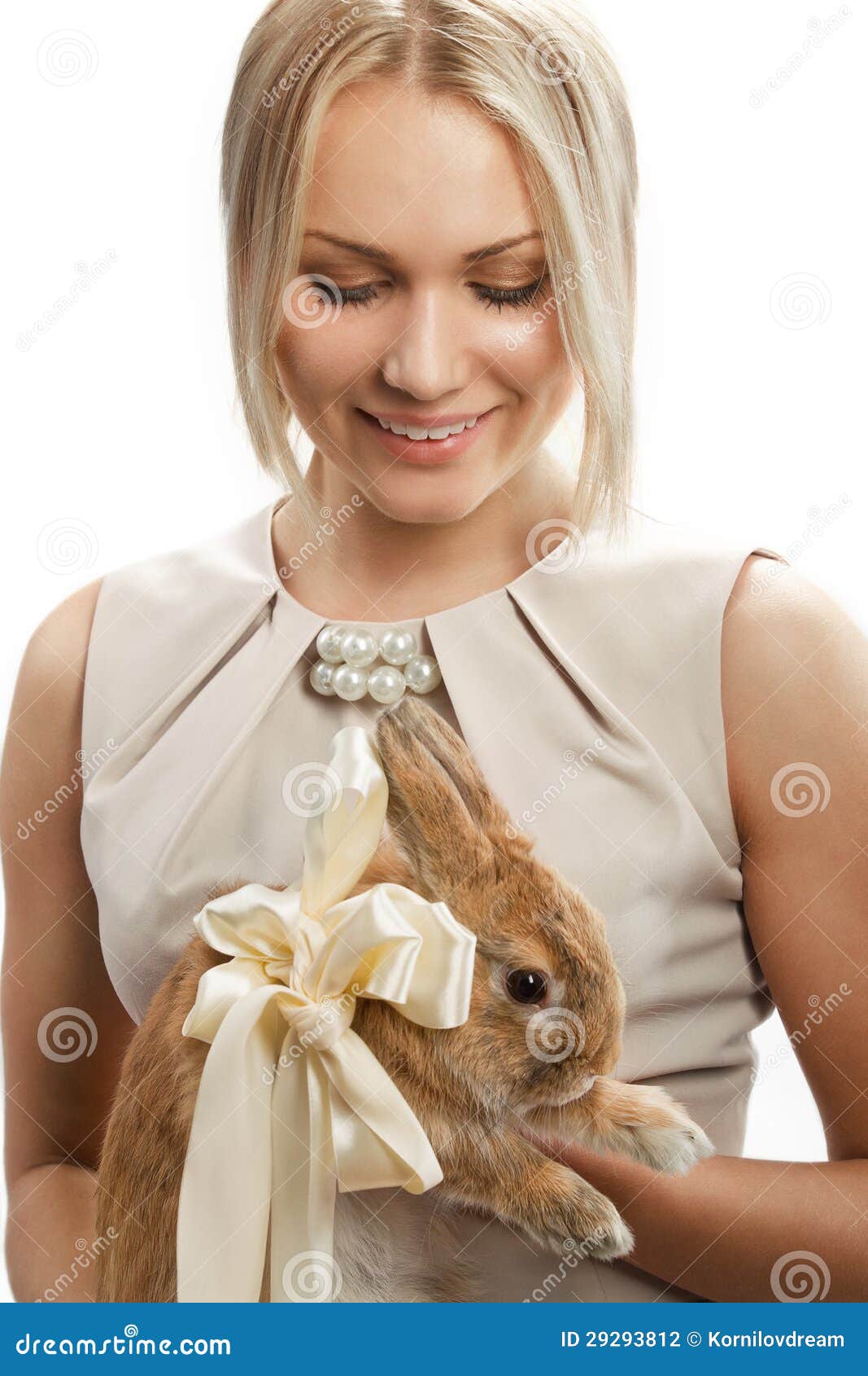 Pretty girl with a rabbit stock photo. Image of people - 29293812