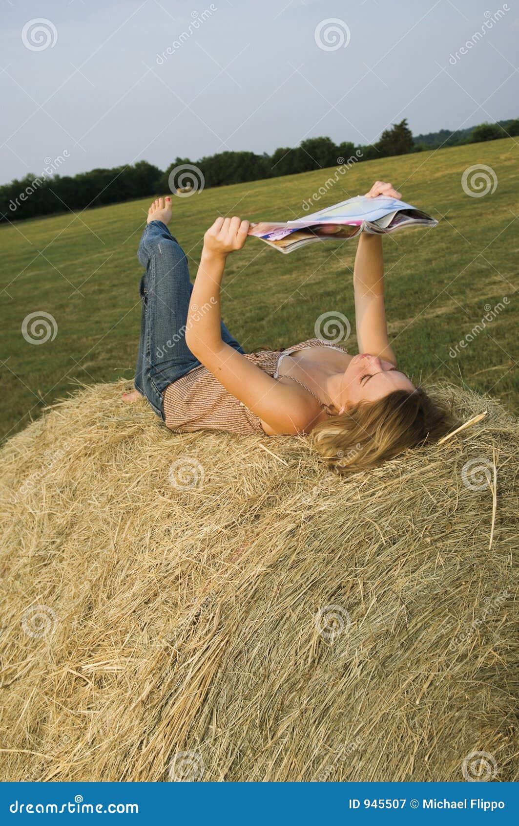 Pretty Girl Reading Magazine on Farm Stock Image - Image of attractive ...