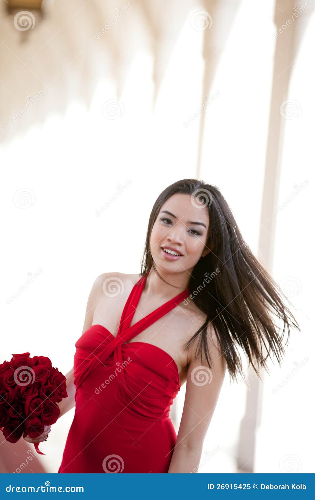 Pretty Girl in a red Dress stock image. Image of facing - 26915425