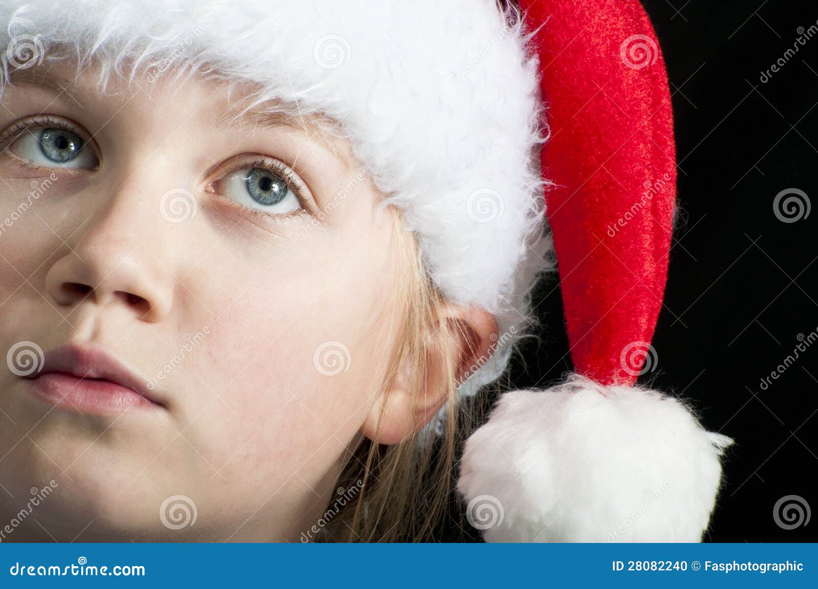 Pretty girl in santa hat stock photo. Image of adorable - 28082240