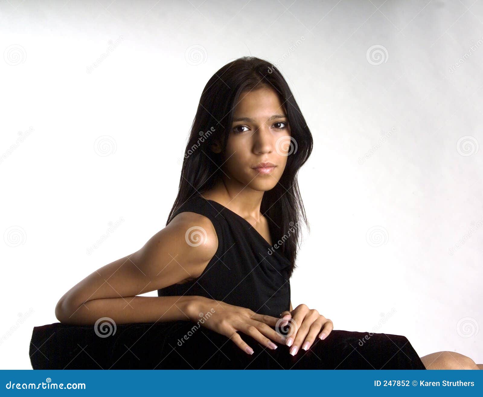 Pretty girl seated stock photo. Image of sitting, long - 247852