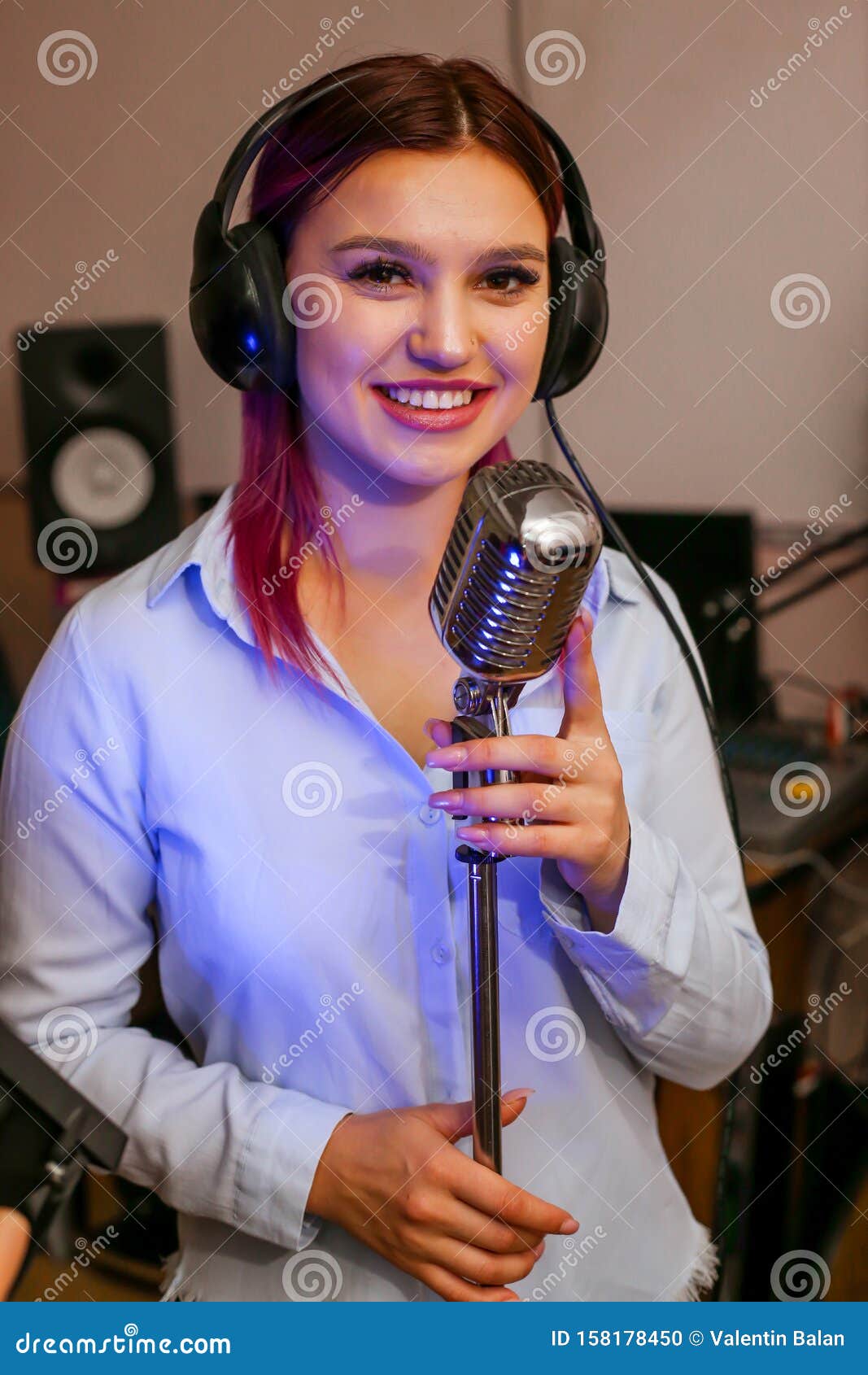 Pretty Girl Singing into Studio Microphone. Stock Photo - Image of ...
